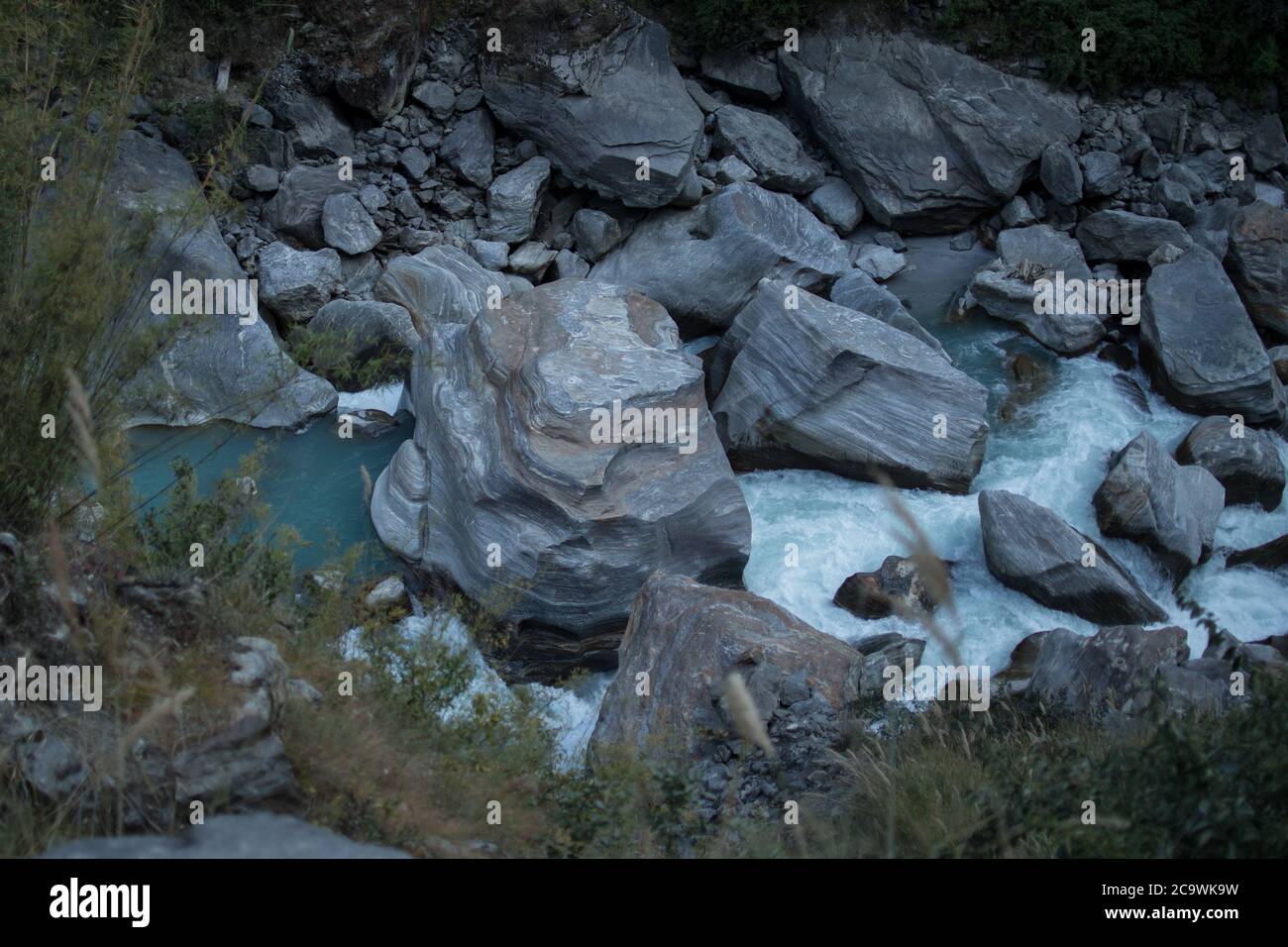 Beautiful marshyangdi river flowing peacefully through a valley ...