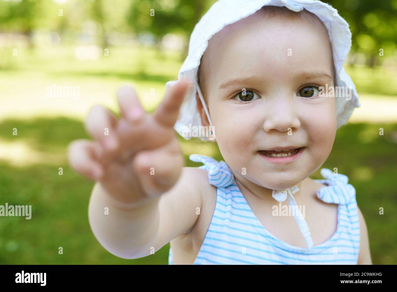 Baby Pointing At Camera