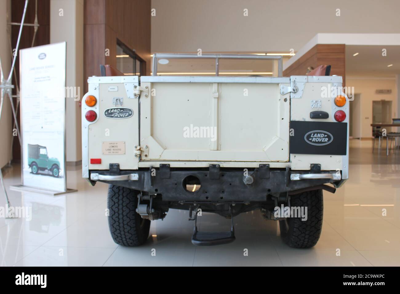 Legacy Land Rover Defender model exhibited in a Land Rover showroom to ...