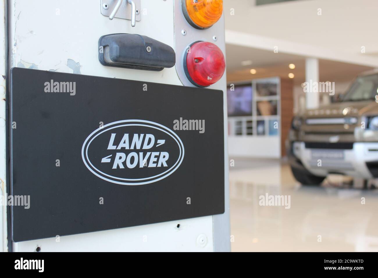 Legacy Land Rover Defender model exhibited in a Land Rover showroom to ...