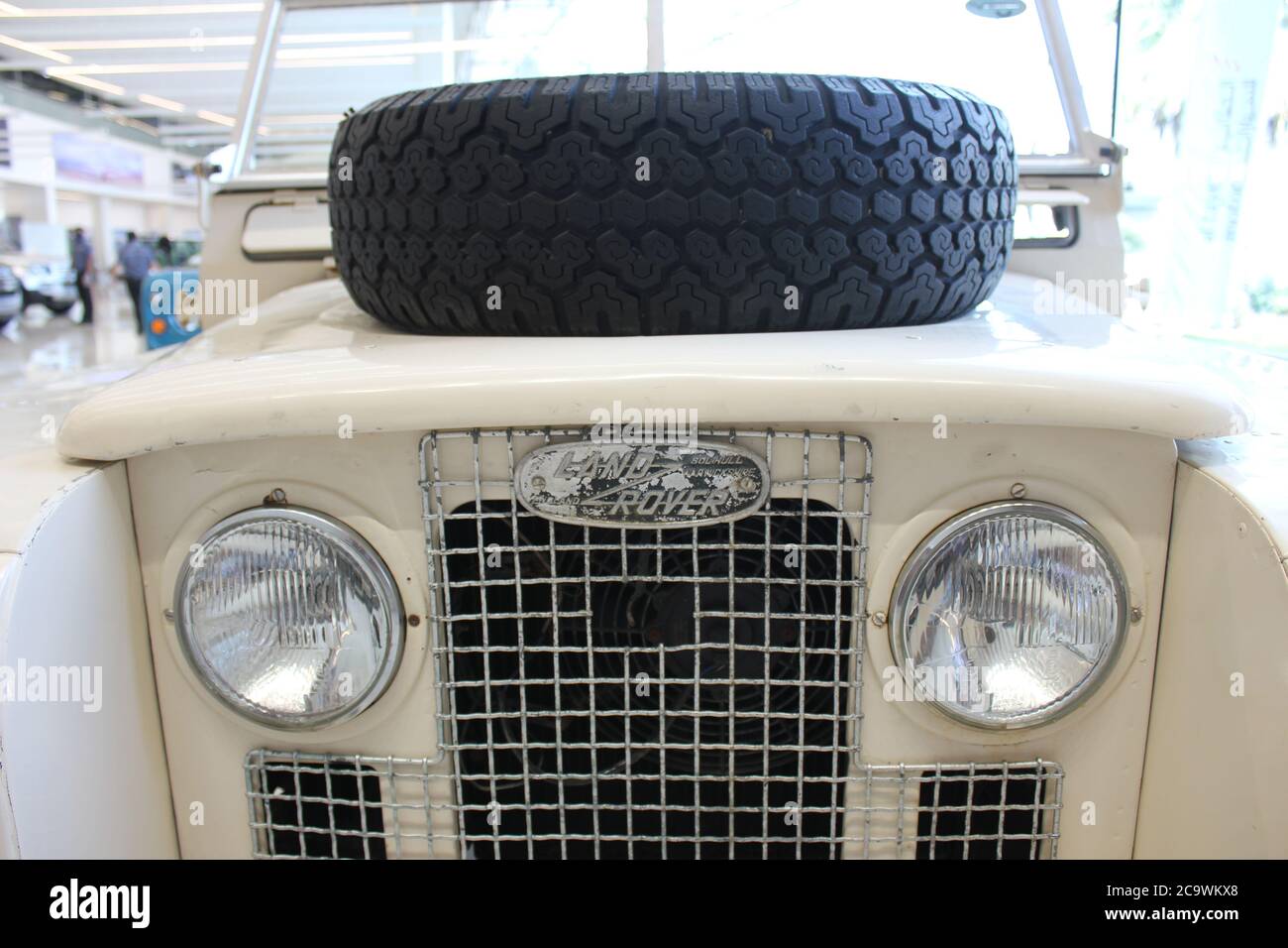 Legacy Land Rover Defender model exhibited in a Land Rover showroom to ...