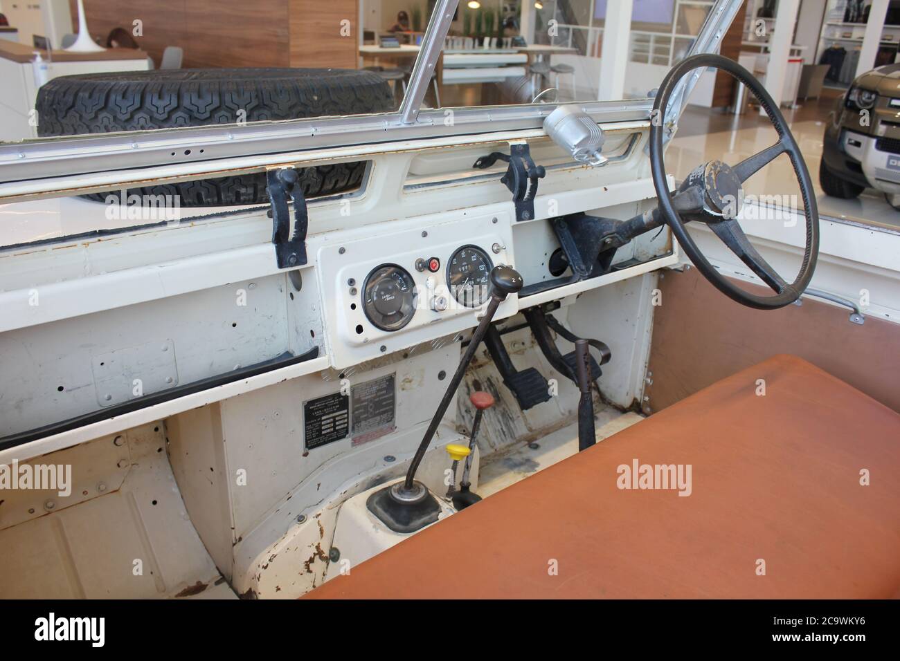 Legacy Land Rover Defender model exhibited in a Land Rover showroom to ...