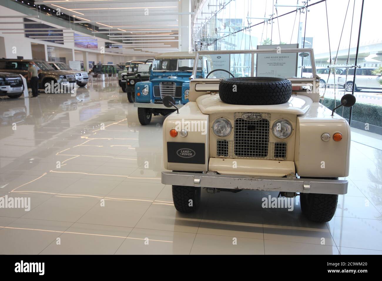 Legacy Land Rover Defender model exhibited in a Land Rover showroom to ...