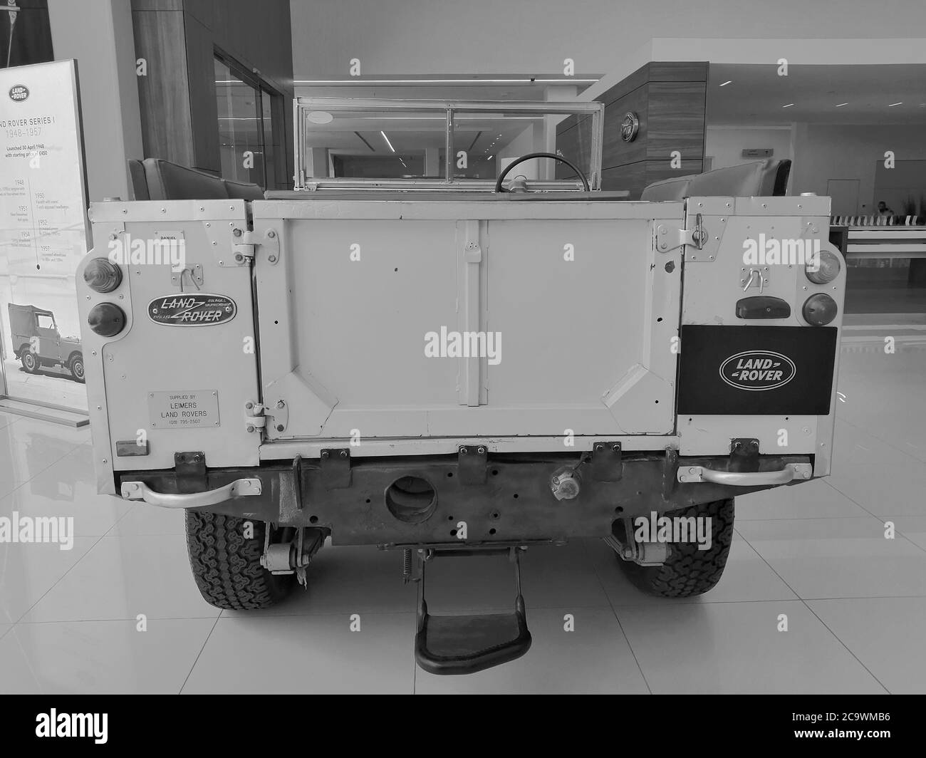 Legacy Land Rover Defender model exhibited in a Land Rover showroom to ...