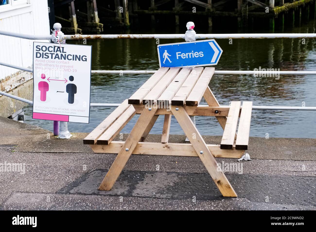 Social distancing sign for shop customer queue Stock Photo - Alamy