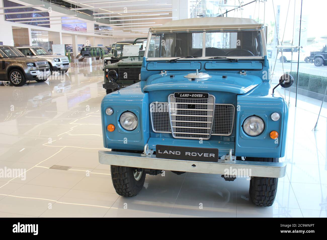 Legacy Land Rover Defender model exhibited in a Land Rover showroom ...