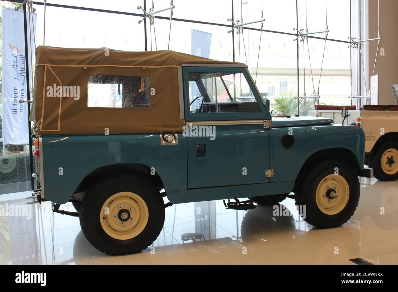 Legacy Land Rover Defender model exhibited in a Land Rover showroom ...