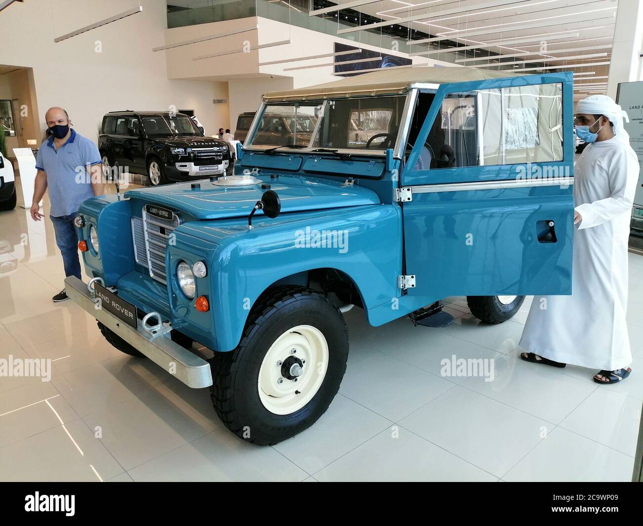 Legacy Land Rover Defender model exhibited in a Land Rover showroom ...