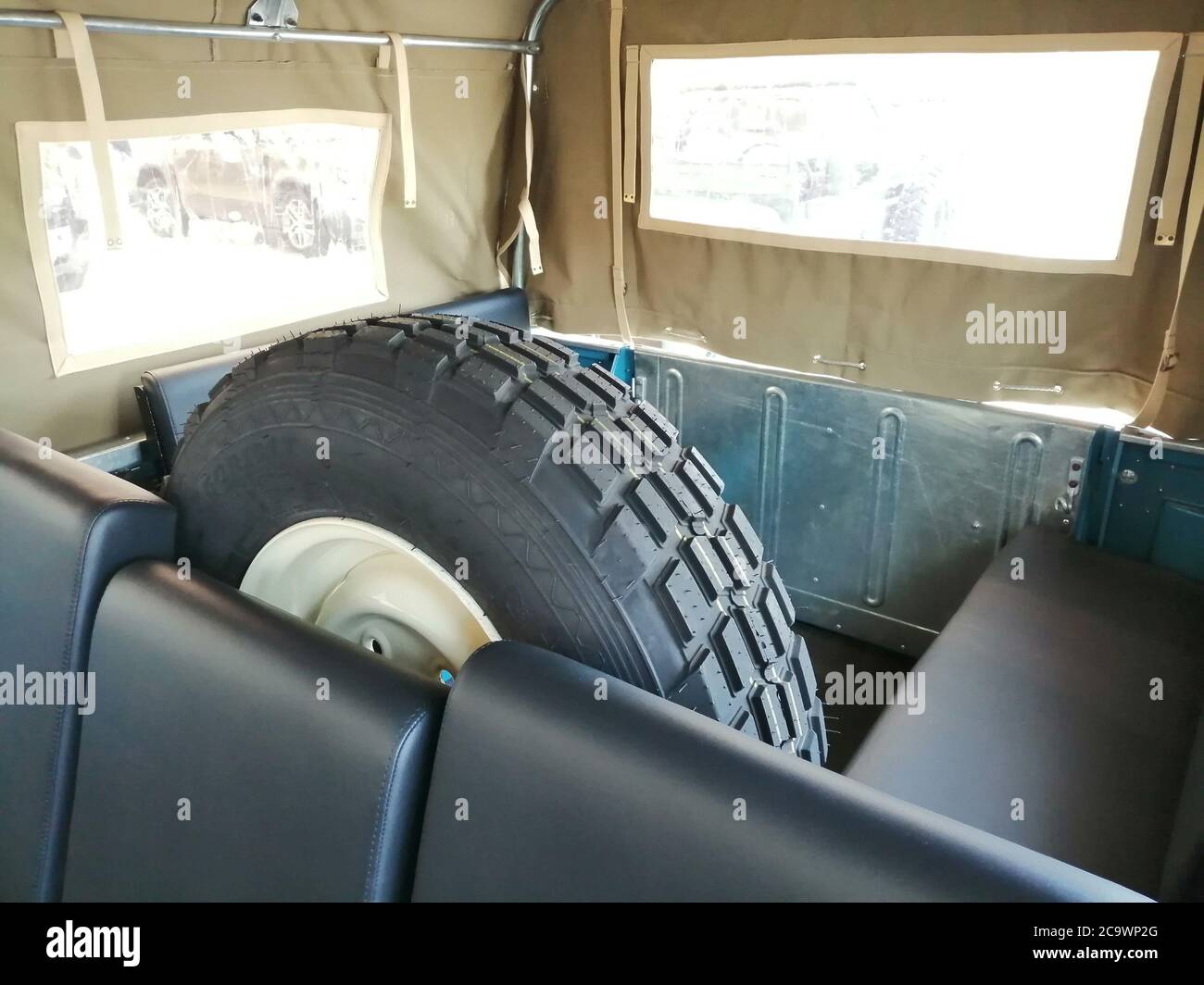 Legacy Land Rover Defender model exhibited in a Land Rover showroom ...
