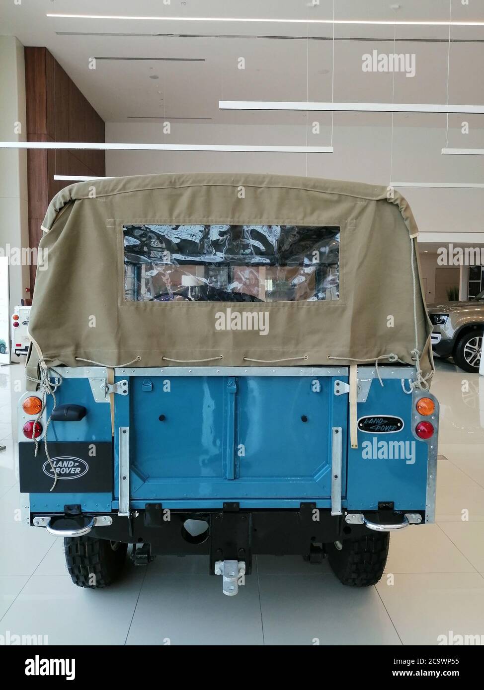 Legacy Land Rover Defender model exhibited in a Land Rover showroom ...