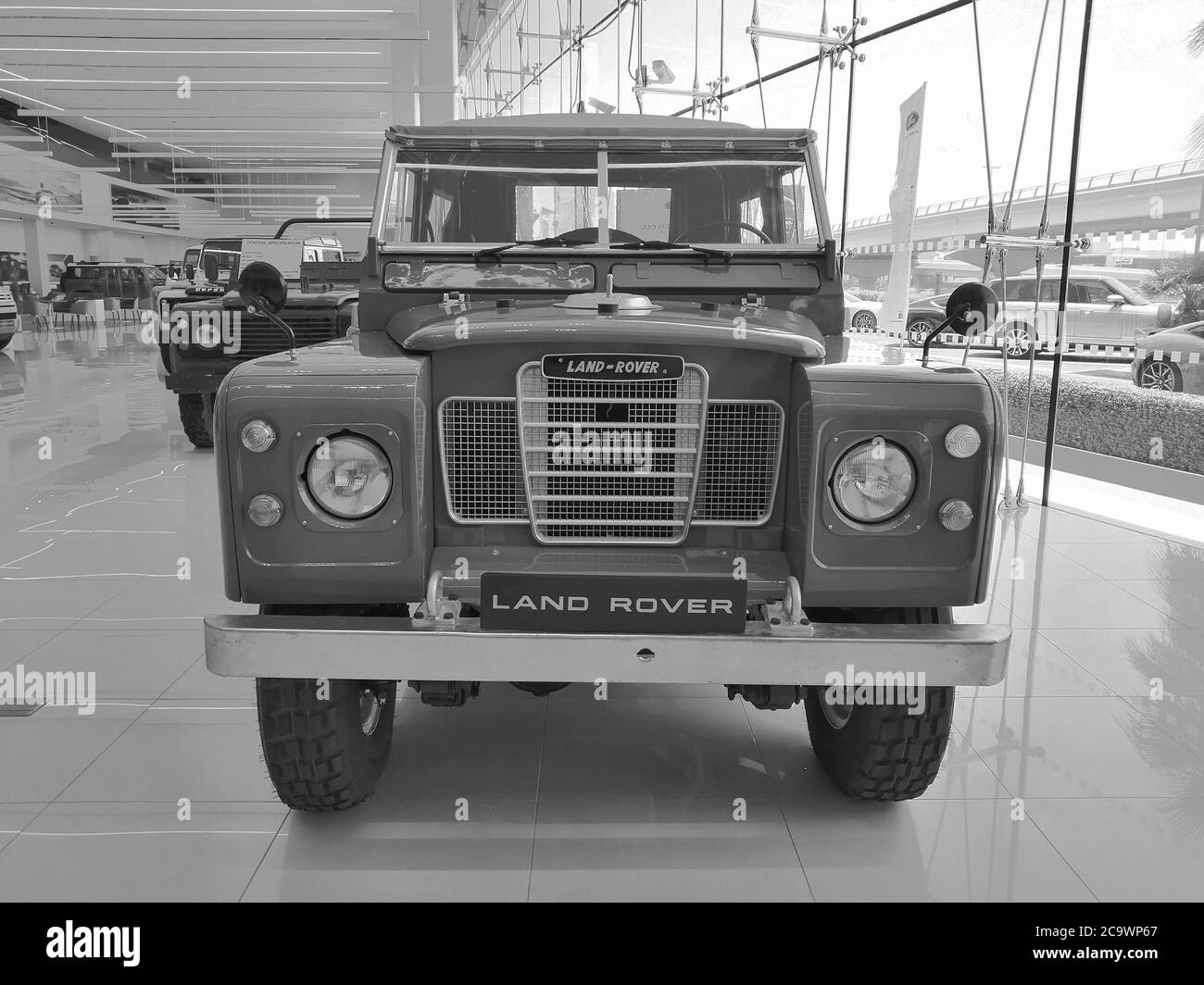 Legacy Land Rover Defender model exhibited in a Land Rover showroom ...