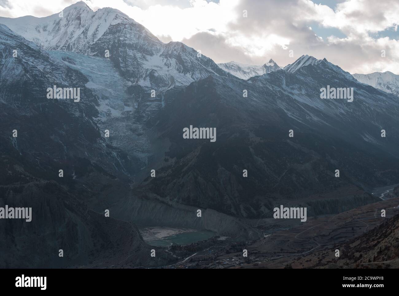 Mountain glacier over Manang village, trekking Annapurna circuit ...