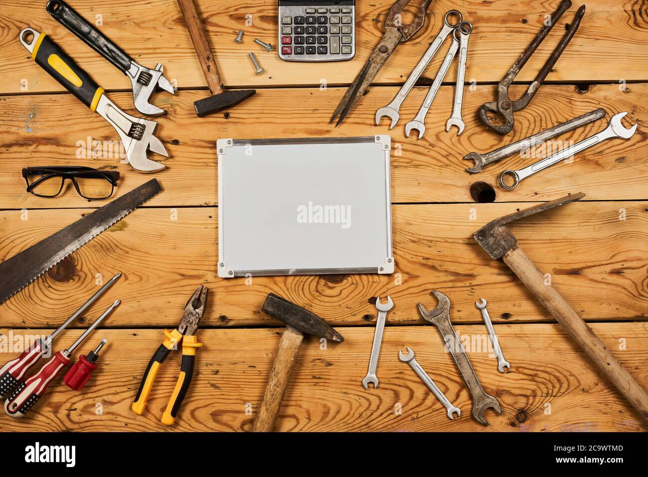 Labor day background with different working tools placed around the ...