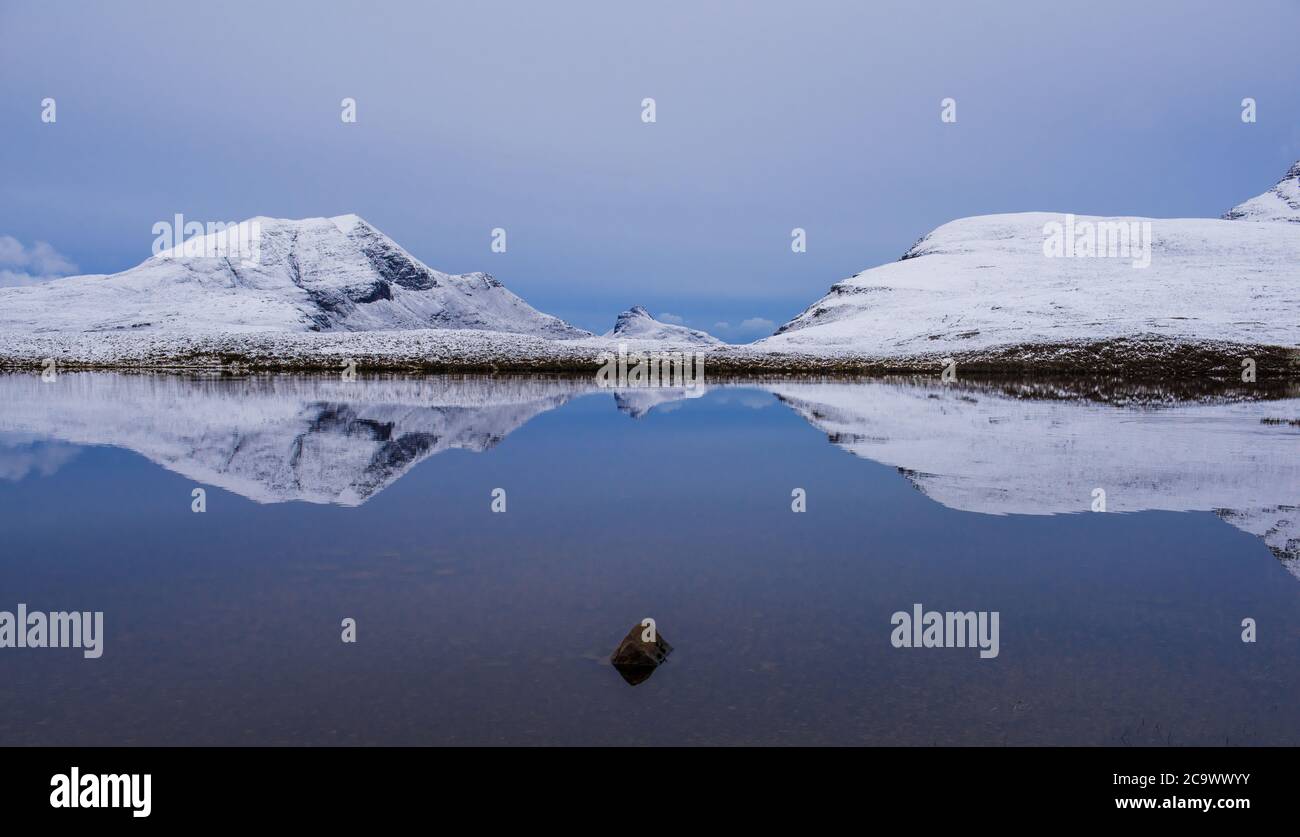 Blue scottish loch in snow hi-res stock photography and images - Alamy