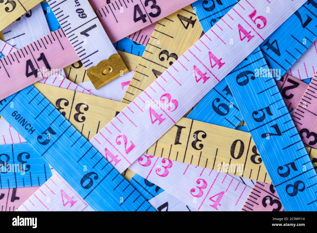 White measuring tape tailor hi-res stock photography and images - Alamy