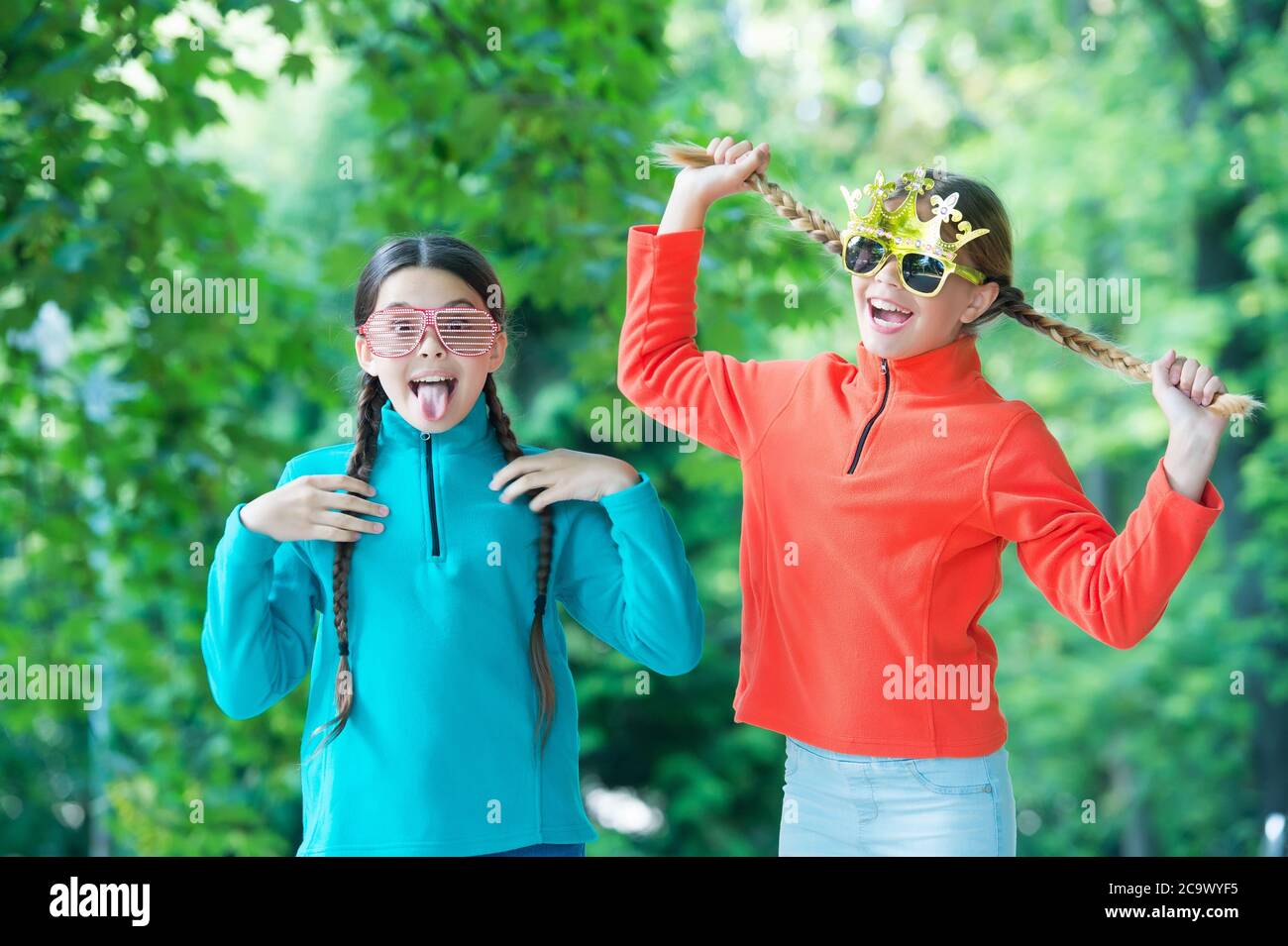 Cheerful kids having fun while hiking forest nature background, funny ...