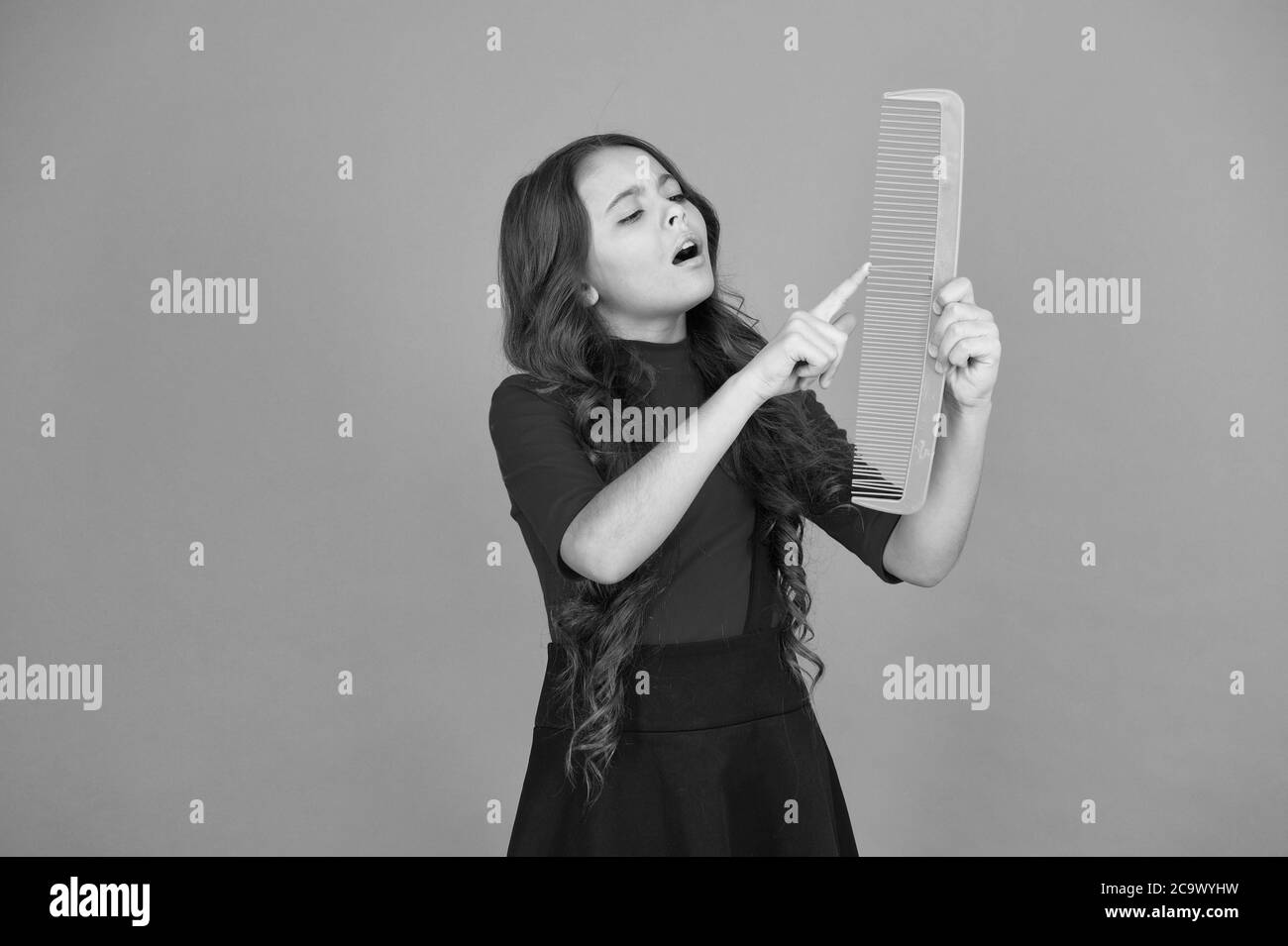 Finger combing Black and White Stock Photos & Images - Alamy