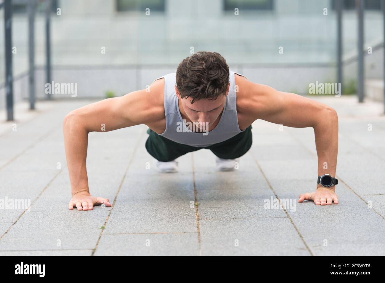 Caucasian athlete man doing push-ups. Fitness man training push up ...