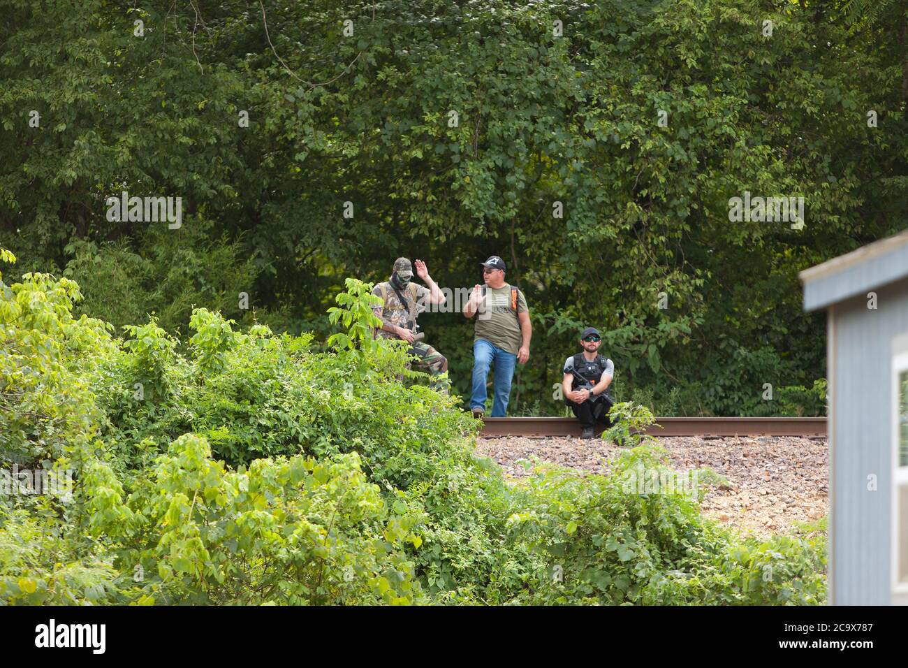 Zinc, Arkansas, USA. 2nd Aug, 2020. Aug. 2, 2020: Militia from the town ...