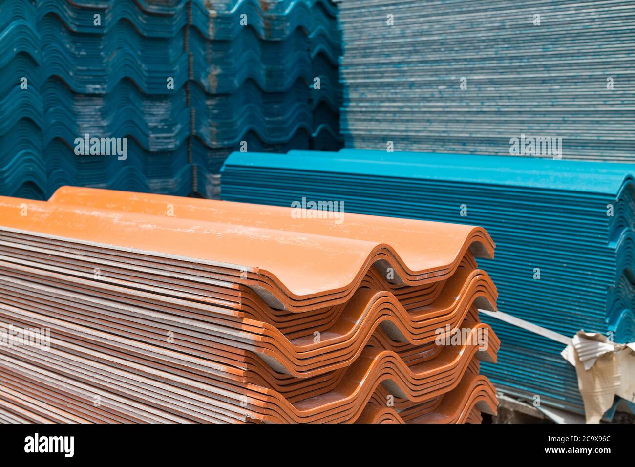 Stack of old roof tiles in warehouse Stock Photo - Alamy