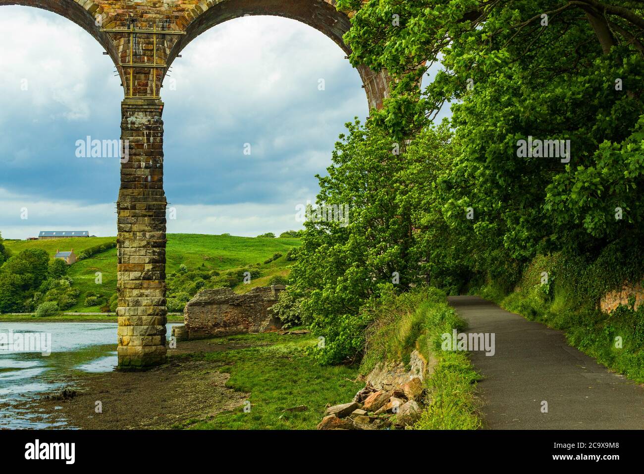 Pathway below Royal Border Bridge in Berwick-upon-Tweed, UK Stock Photo ...