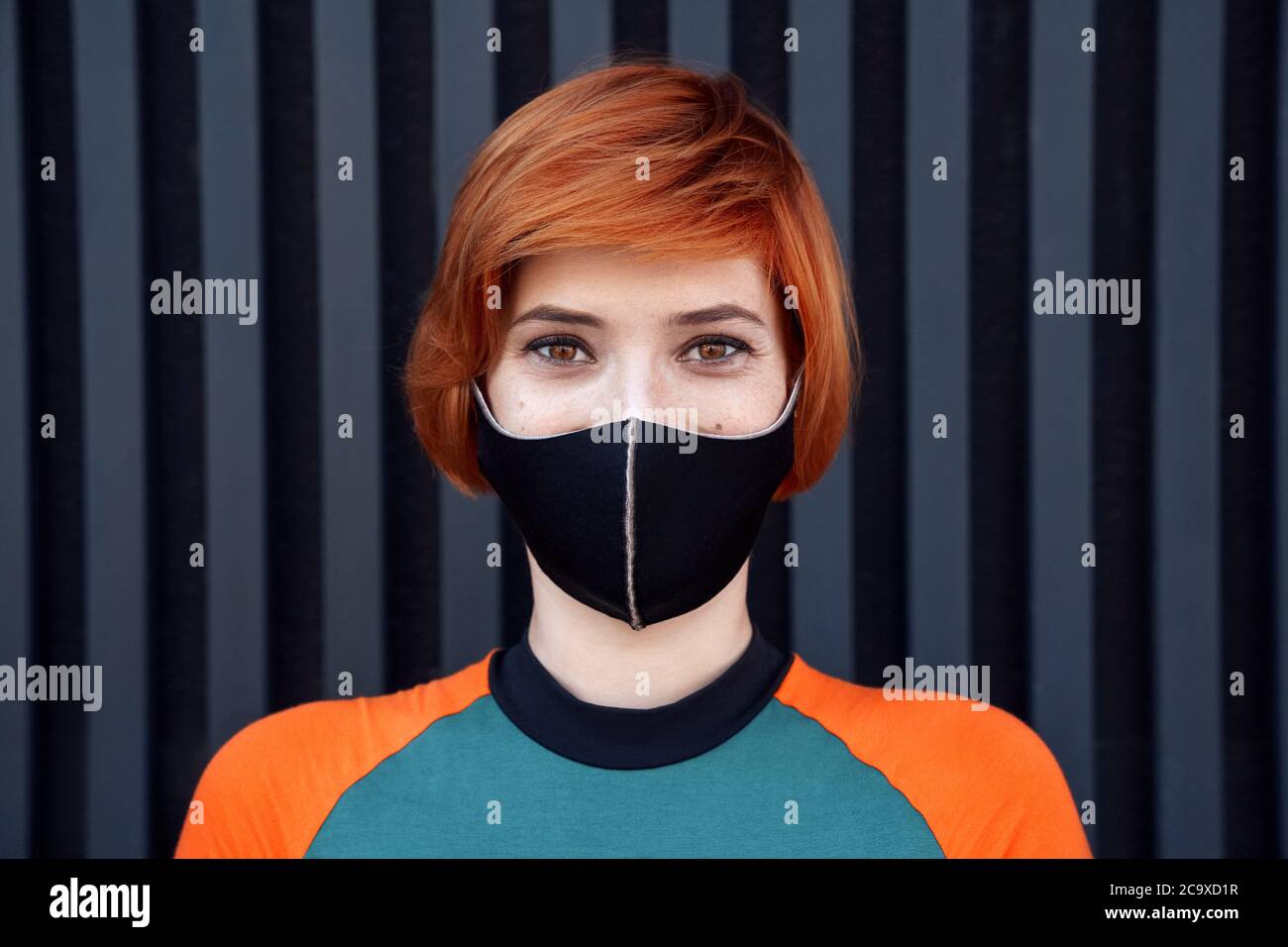 Redhead woman mask hi-res stock photography and images - Alamy