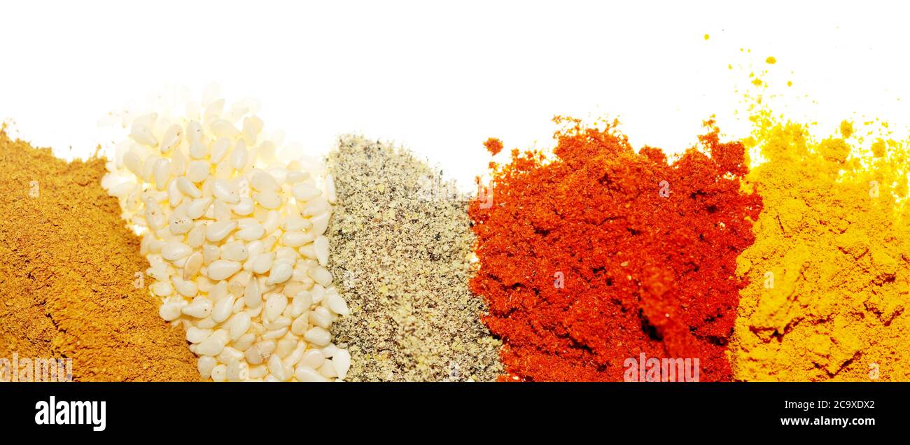 Spices isolated on white background Stock Photo - Alamy