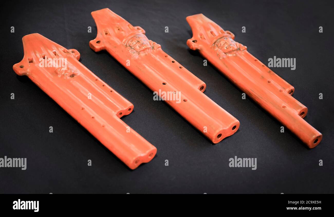 Traditional South American Indian handmade clay pipes of different ...