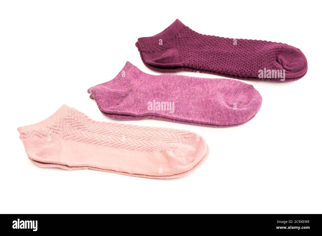 Three pairs of socks isolated on white background Stock Photo - Alamy