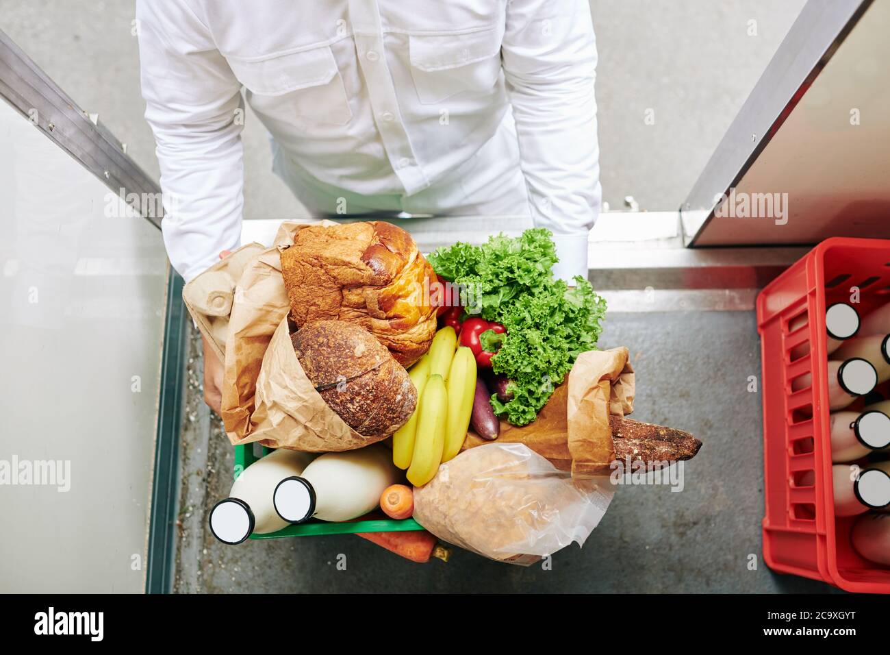 Food delivery man putting fresh hi-res stock photography and images - Alamy