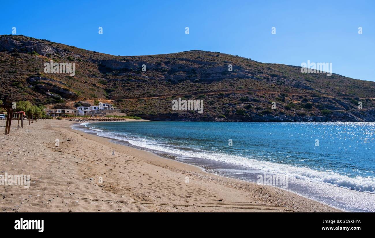 Sandy beach, blue clear sky, calm sea water background, Greece. Kea ...