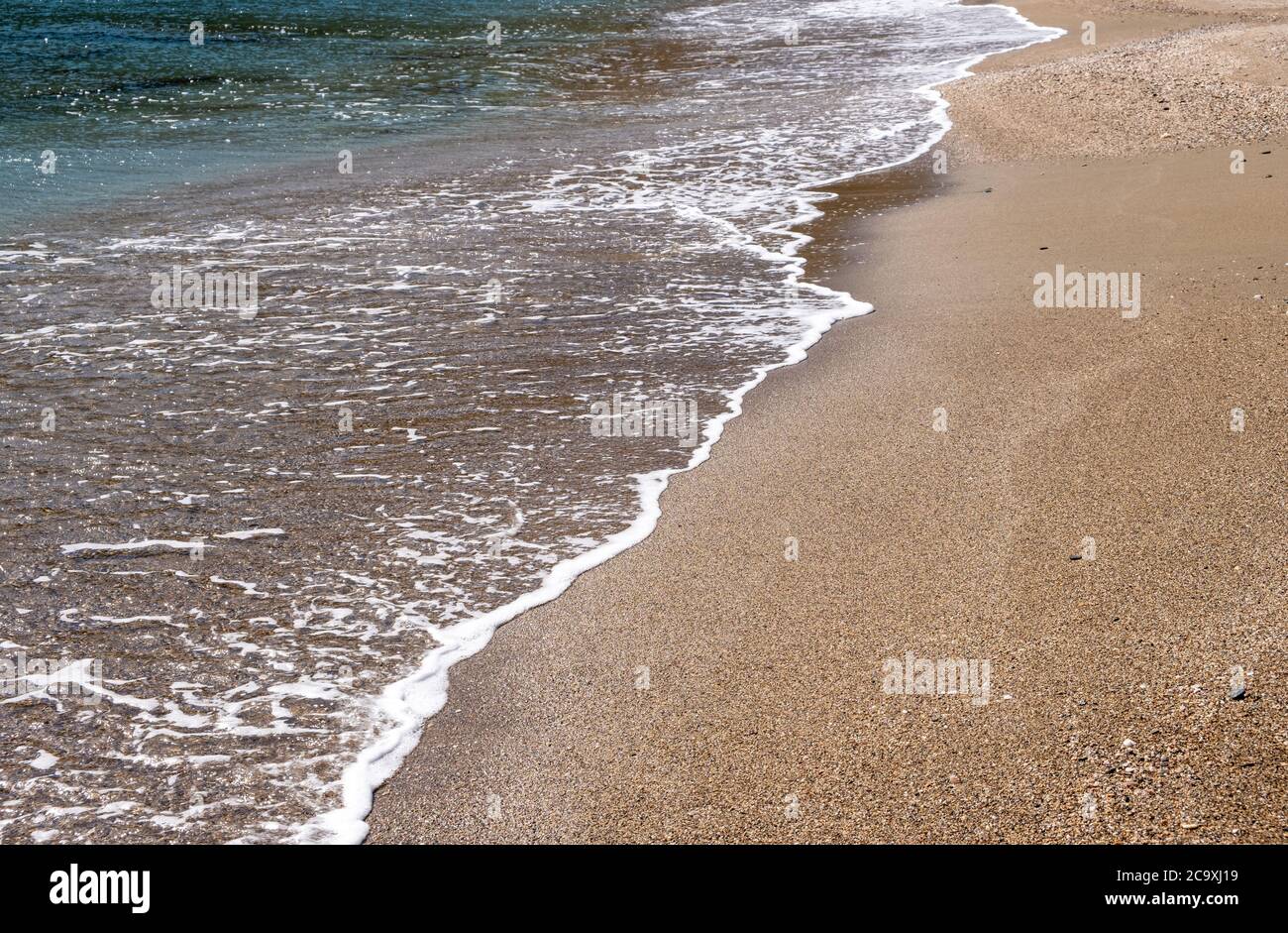 Calm empty sandy beach hi-res stock photography and images - Alamy