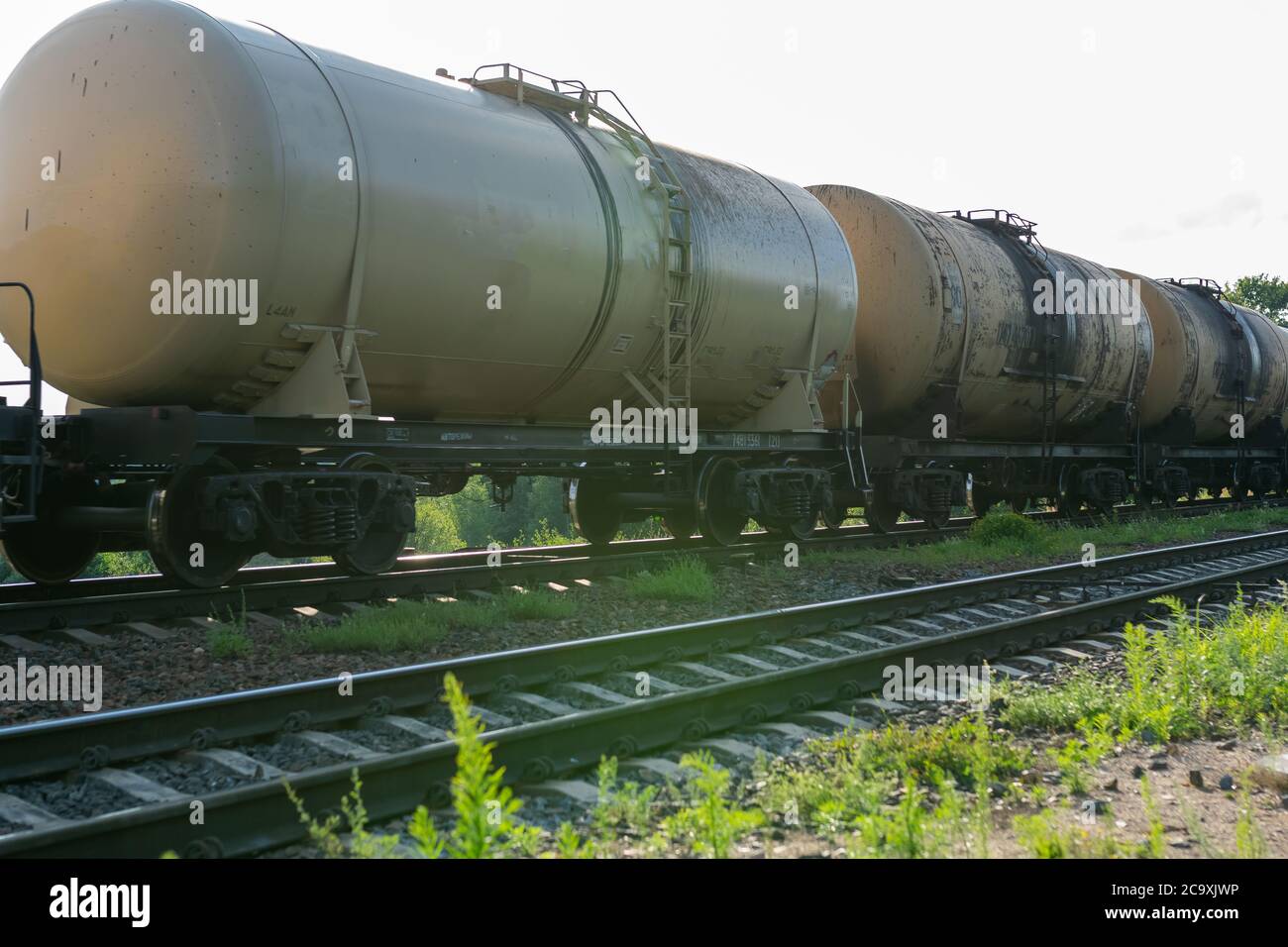 Old barrels of oil on the railway Stock Photo - Alamy