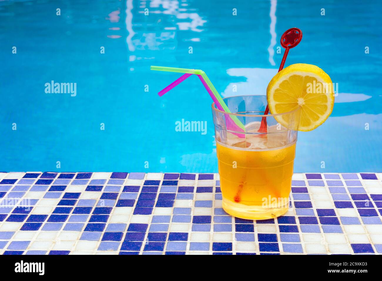 pool swimming cocktail fruit drink summer lemon glass Stock Photo - Alamy