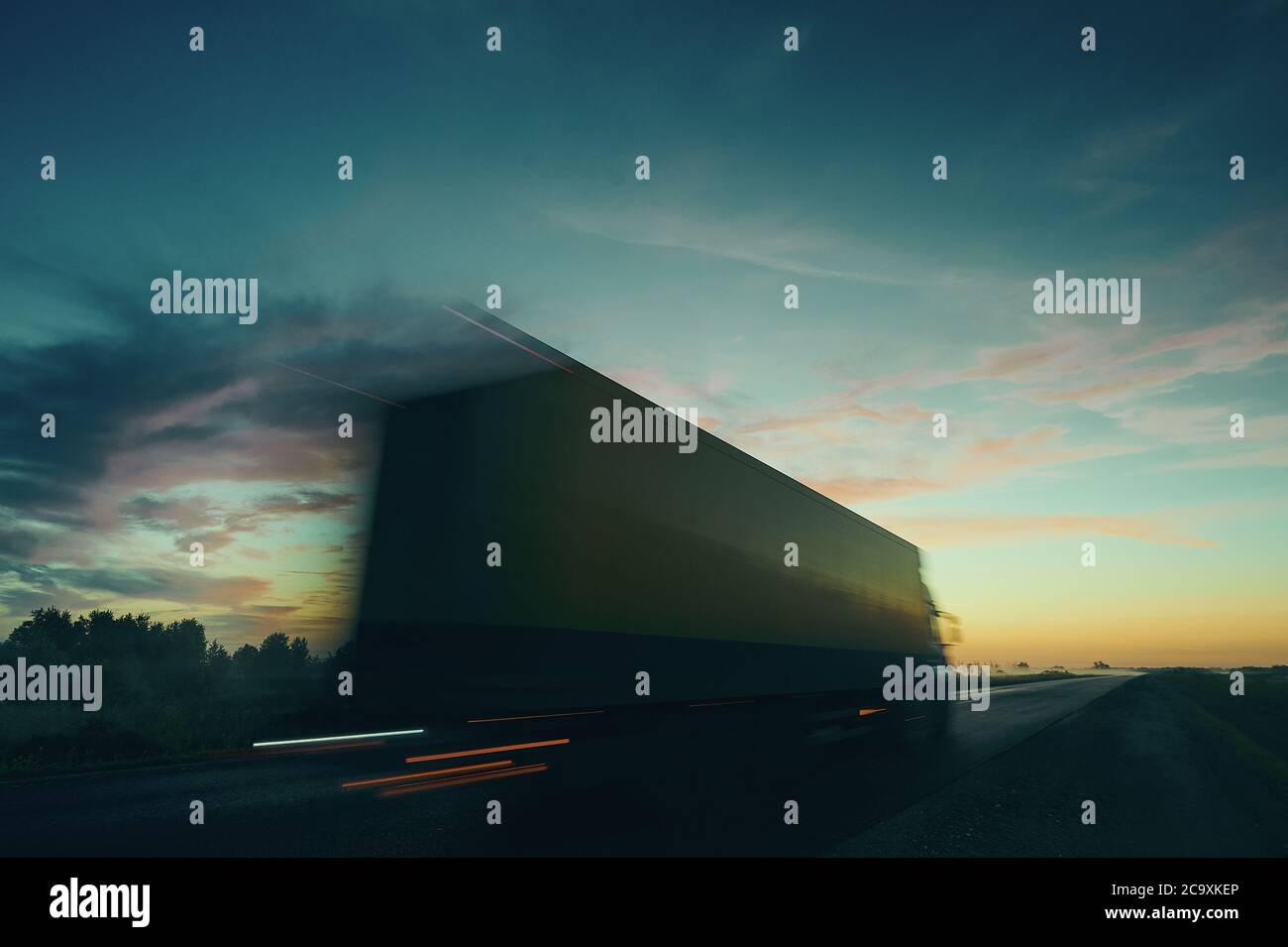 A plane sitting on the tarmac at sunset Stock Photo - Alamy