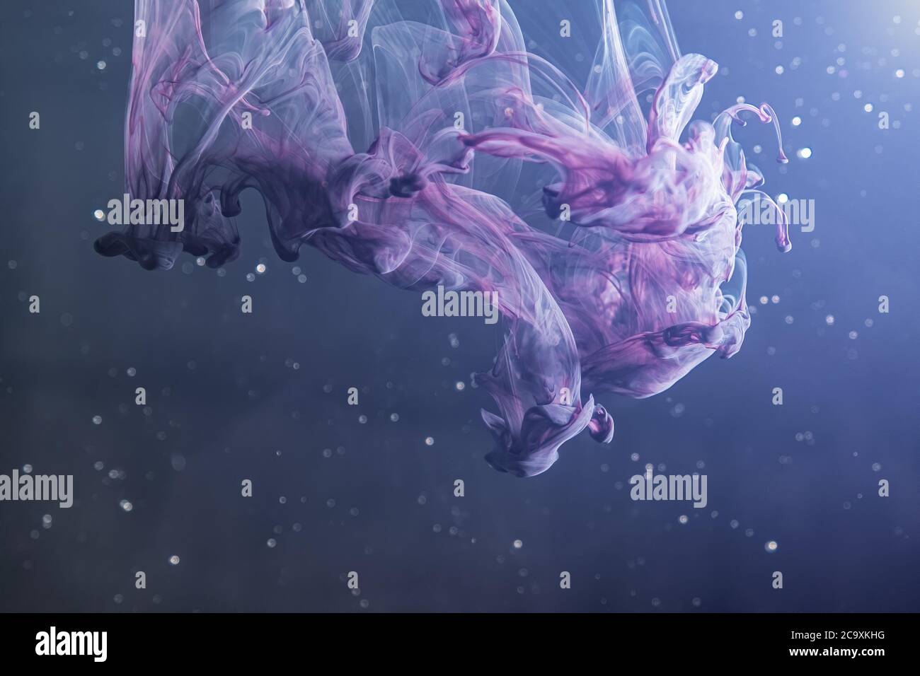 Purple intricate ink splash in water - abstract background texture ...