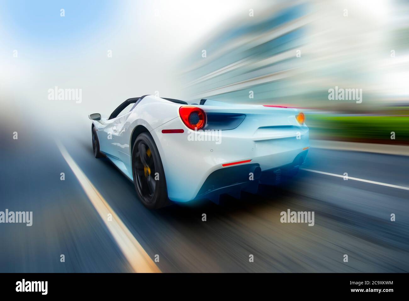 High speed, sport car racing on blure background Stock Photo - Alamy