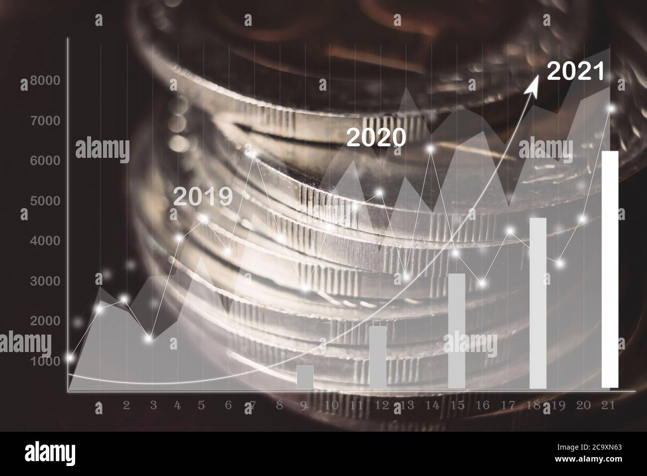 Coins stacked on each other in different positions on dark background ...