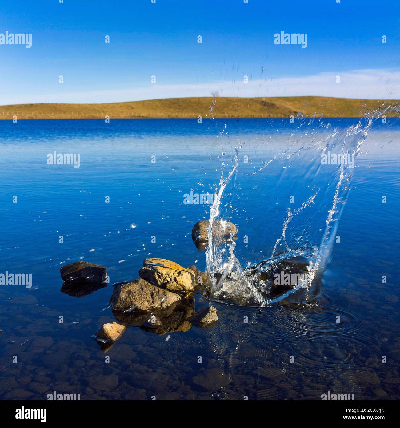 Water splash on Godivelle lake, Puy de Dome, Auvergne-Rhone-Alpes ...