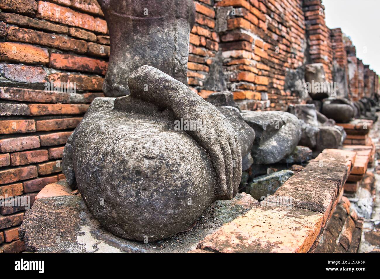 Sitting buddha statue in ancient temple in Asia Stock Photo - Alamy