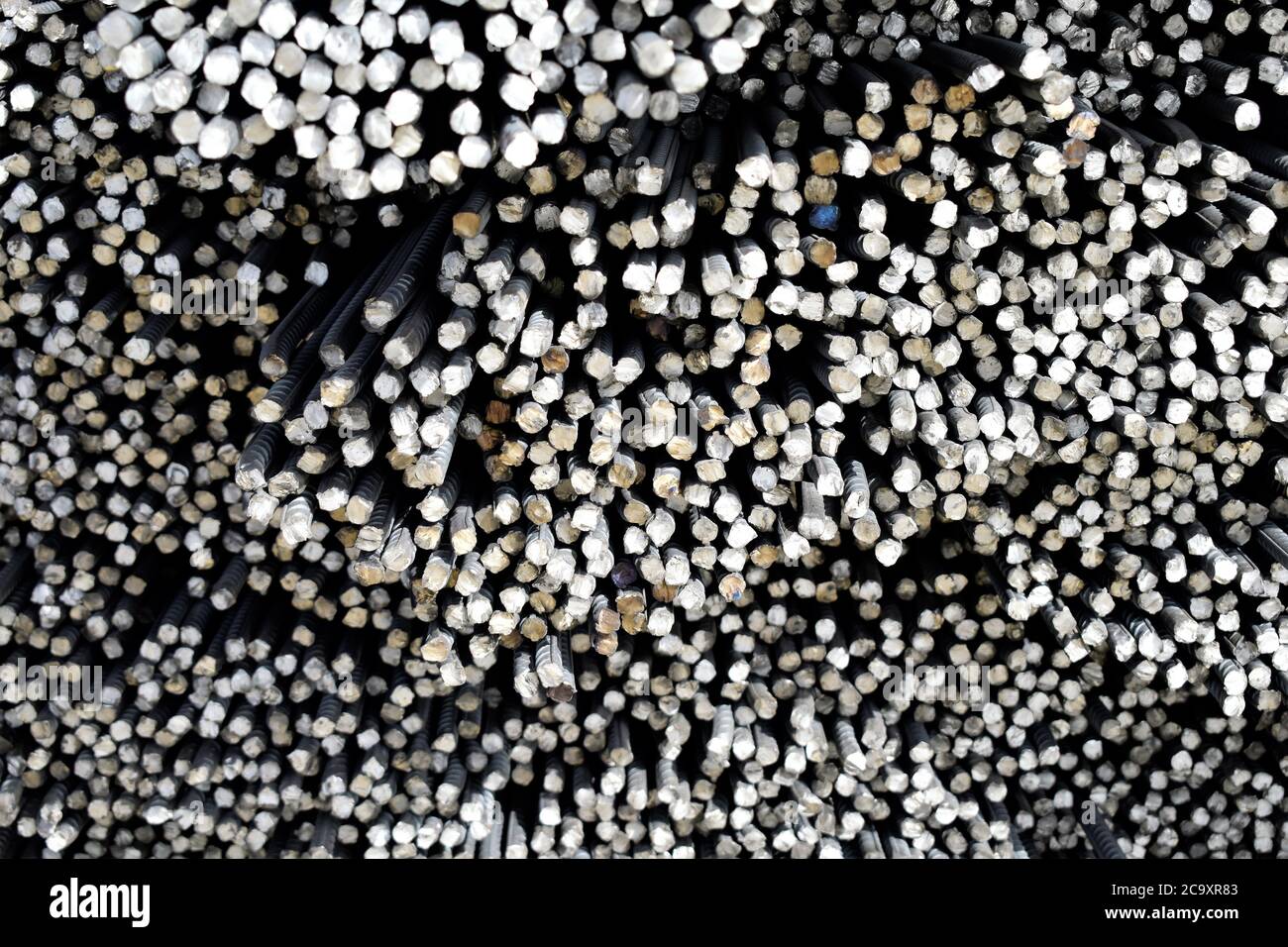 Row of steel rods in the manufacturing industry Stock Photo - Alamy