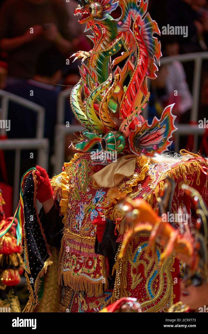 Diablada dancers in ornate costumes parade through the mining city of ...