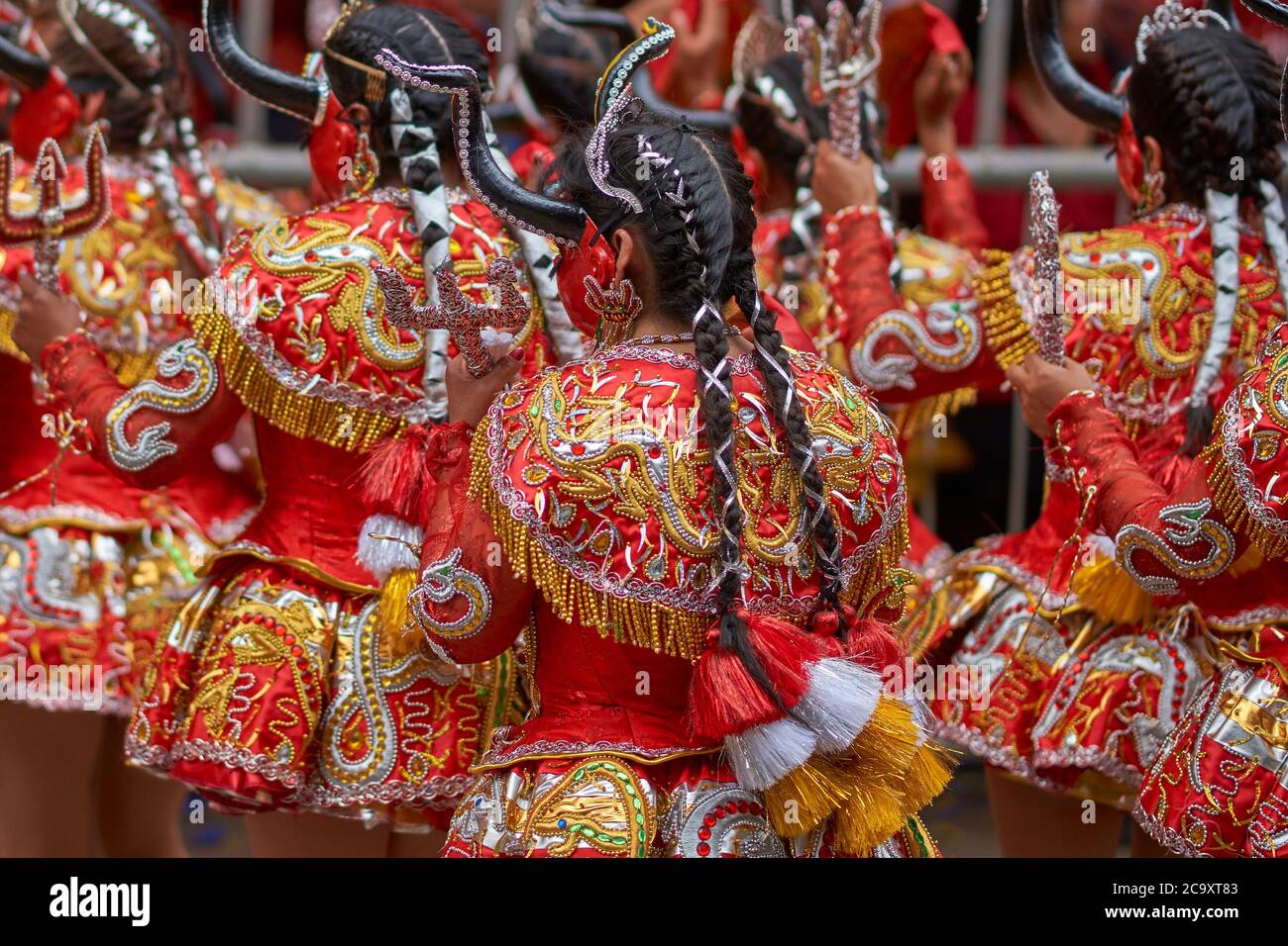 Diablada dancers in ornate costumes parade through the mining city of ...