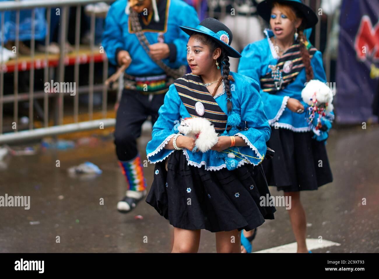 Llamerada dancers in ornate costumes performing as they parade through ...