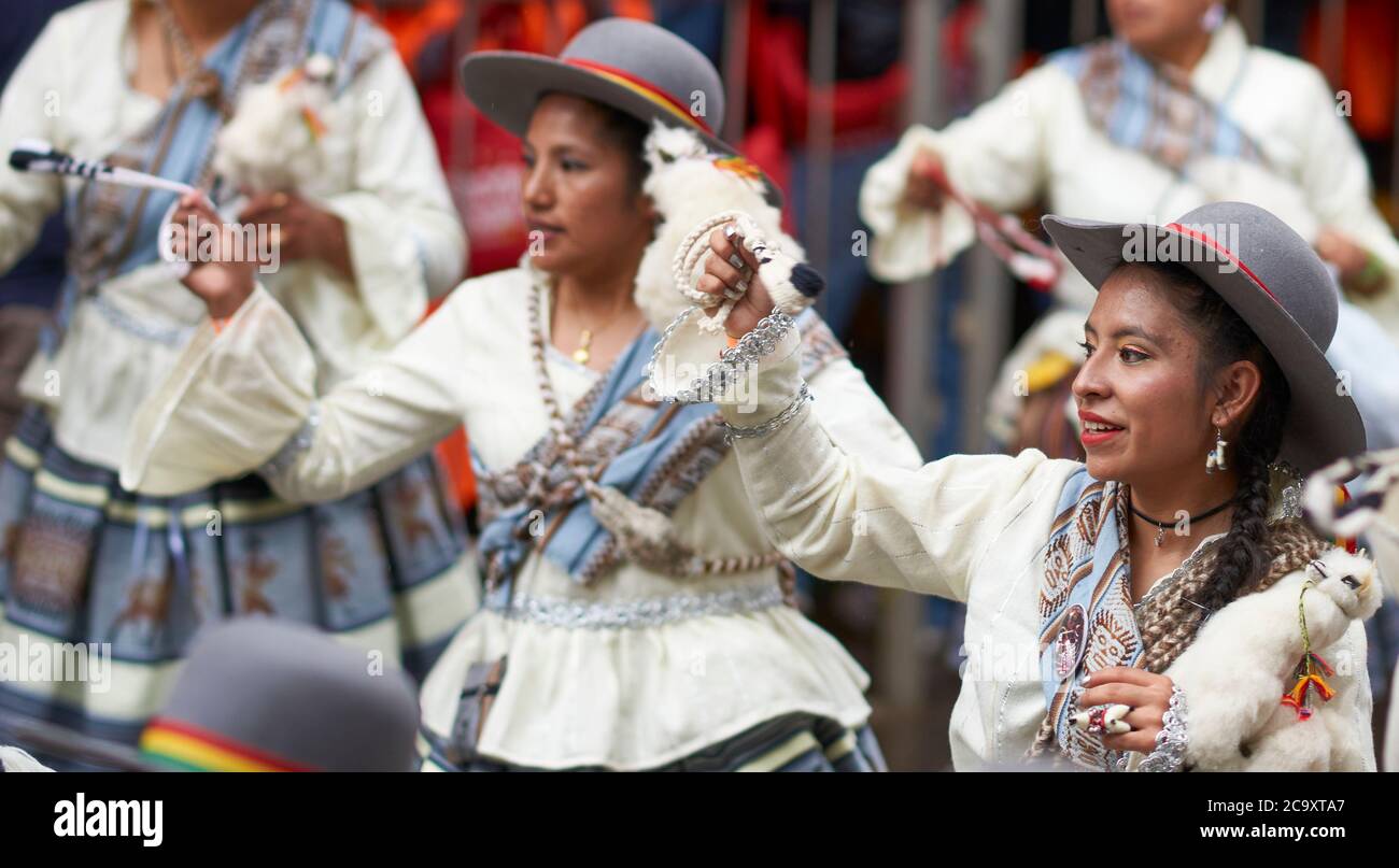 Llamerada dancers in ornate costumes performing as they parade through ...