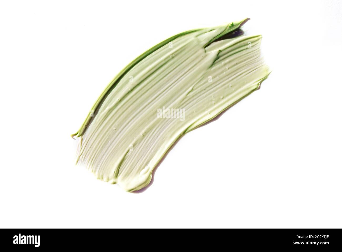 Green cosmetic clay smear isolated on white Stock Photo - Alamy