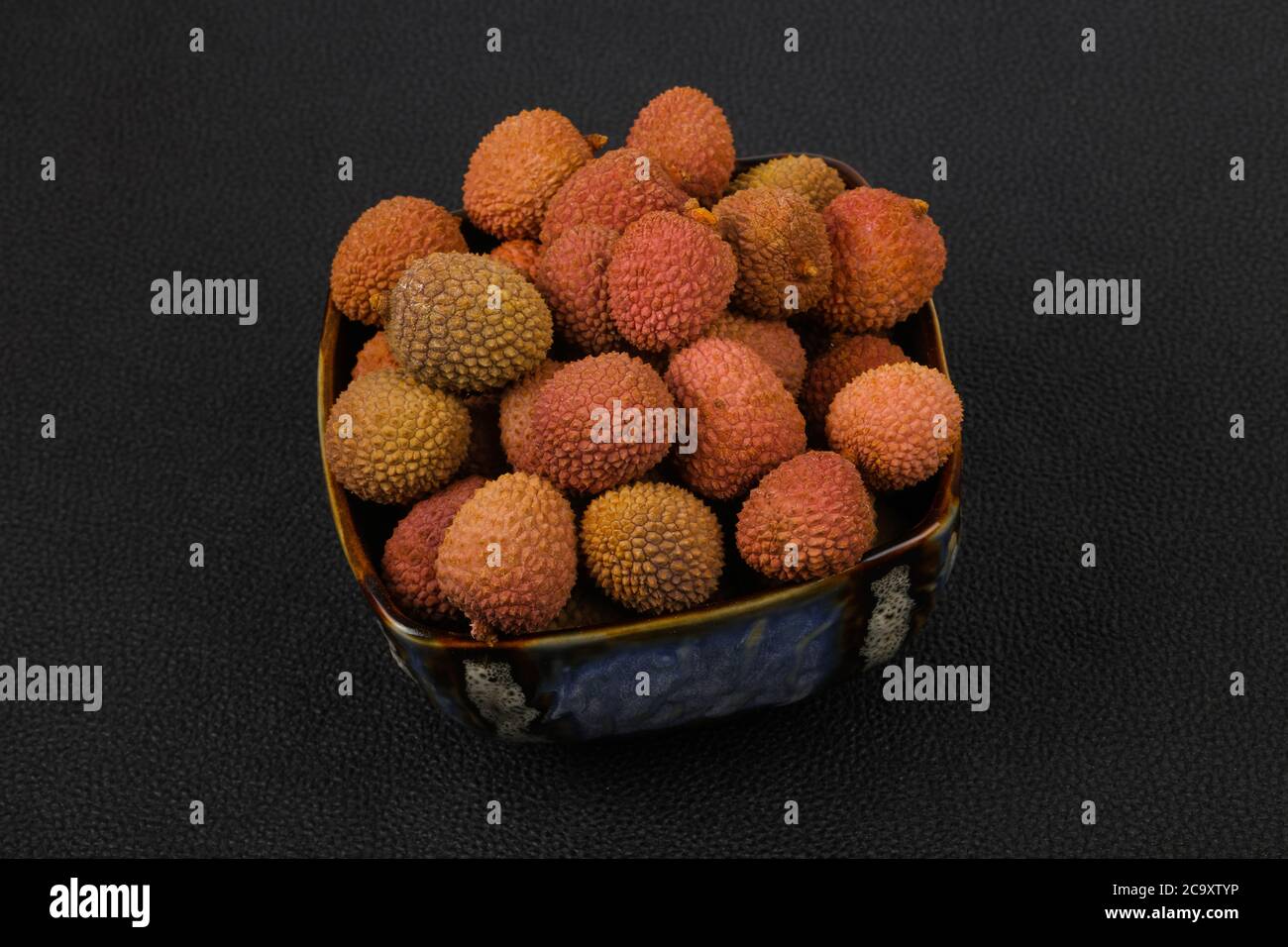 Tropical fruit lychee in the bowl Stock Photo - Alamy