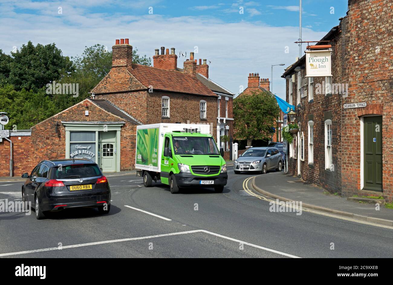 Traffic at mini roundabout in Snaith, East Yorkshire, England UK Stock ...
