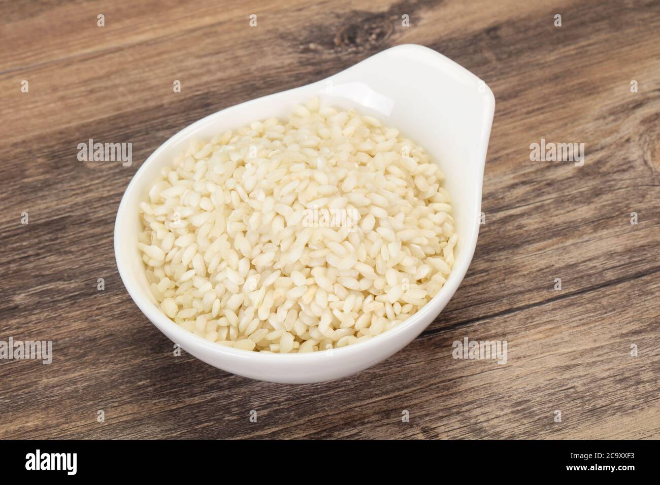 Raw Arborio rice for Italian risotto Stock Photo - Alamy