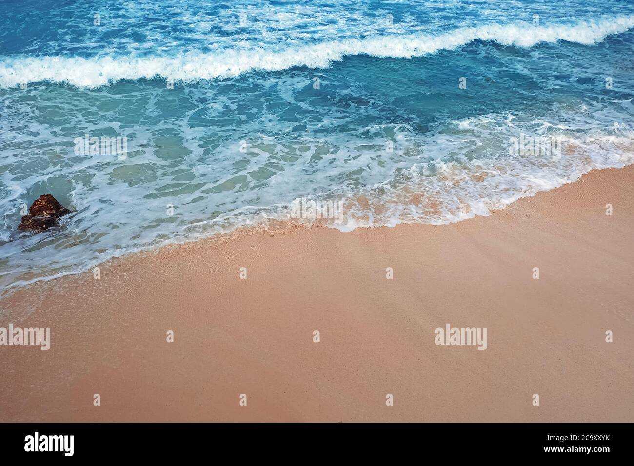 Beautiful empty beach with turquoise ocean Stock Photo - Alamy